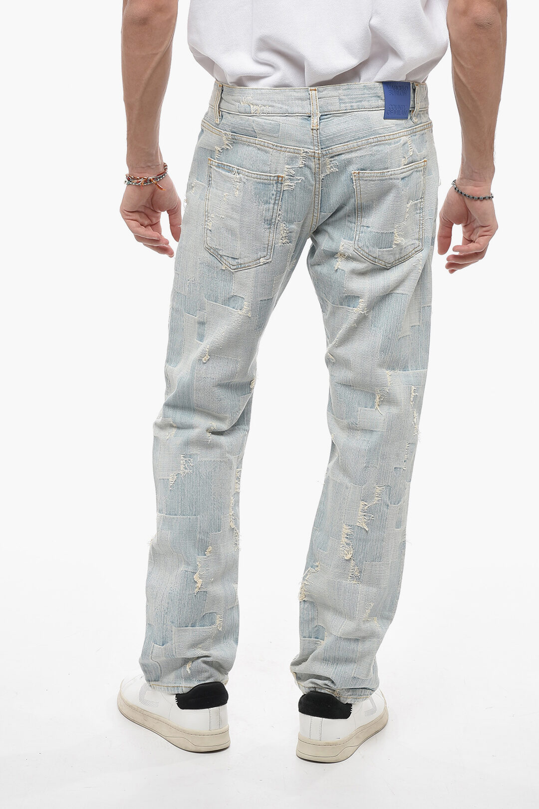 Marcelo Burlon Light-washed Distressed Denims with Patchwork Design men ...