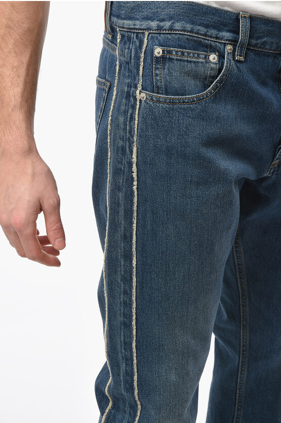 Alexander McQueen Light-washed Straight-leg Denims with Raw-cut ...